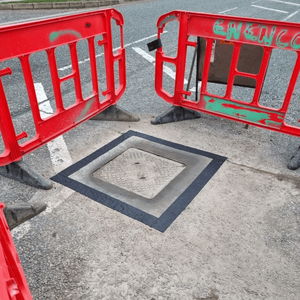 The essential work of repairing manhole covers